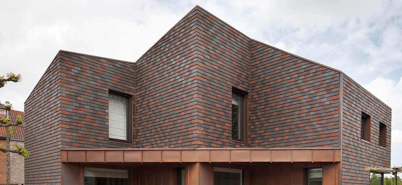 Roofing materials as vertical cladding | Marley
